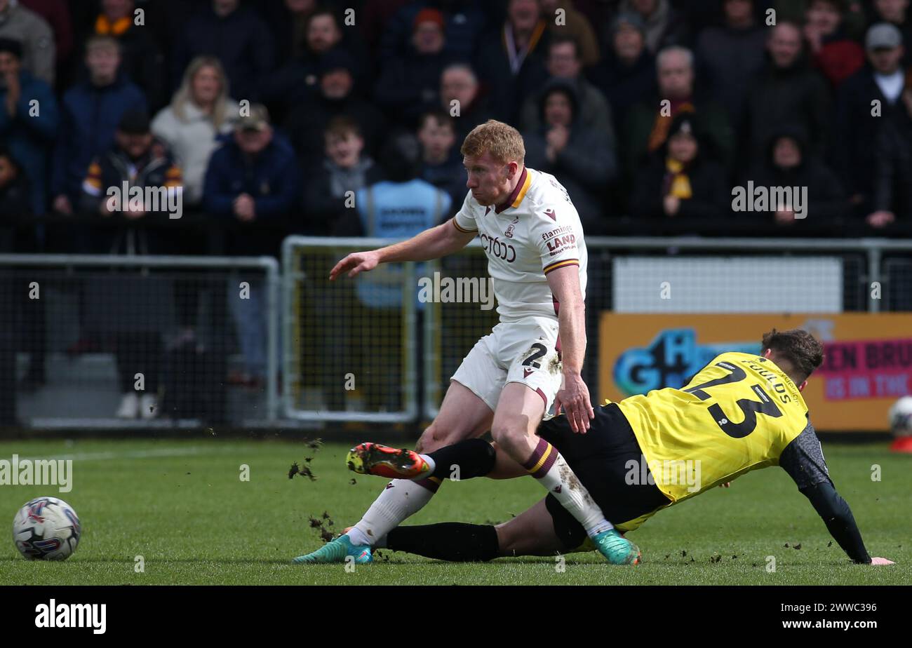 Harrogate Town's Matty Foulds challenges Bradford City's Brad Halliday ...