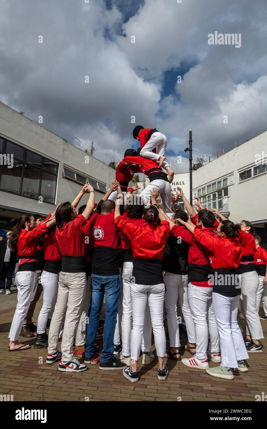 London, UK. 23 March 2024. Castells, ‘human towers’, are built by ...
