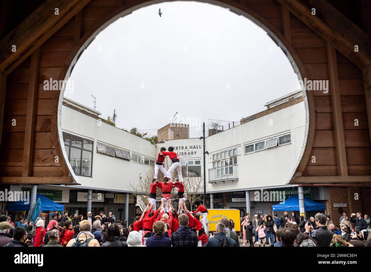 London, UK. 23 March 2024. People watch Castells, ‘human towers’, being ...
