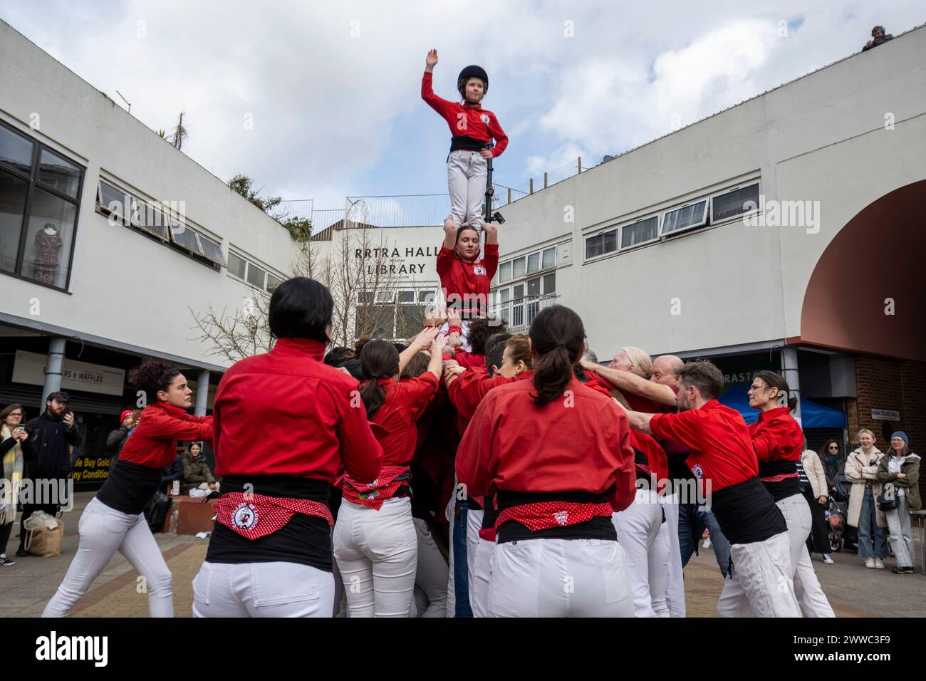 London, UK. 23 March 2024. Castells, ‘human towers’, are built by ...