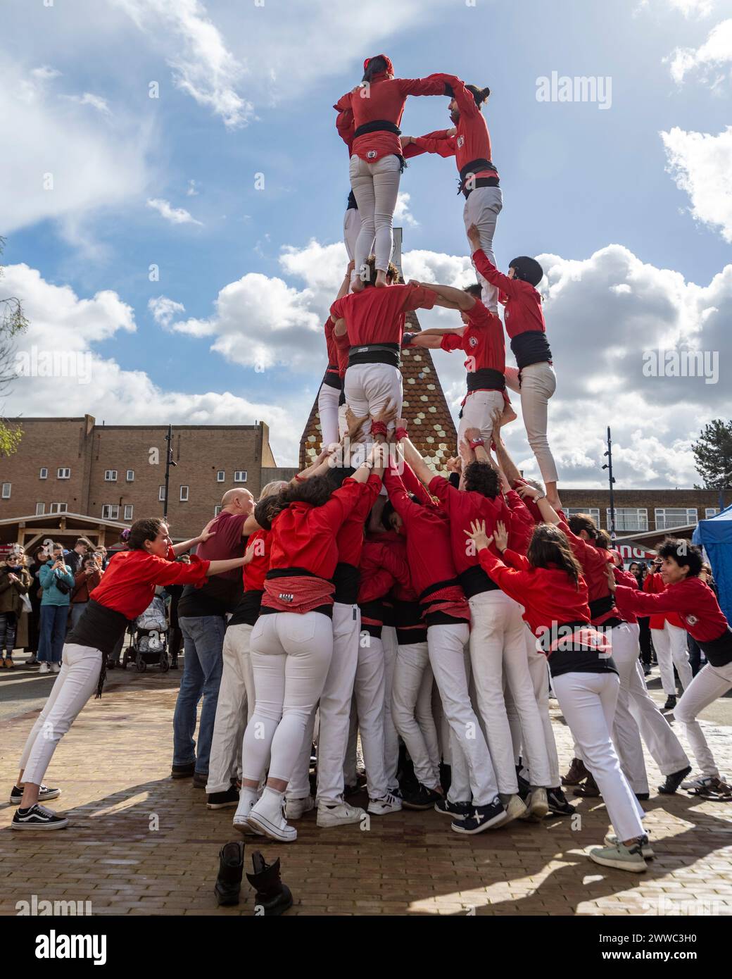 London, UK. 23 March 2024. Castells, ‘human towers’, are built by ...