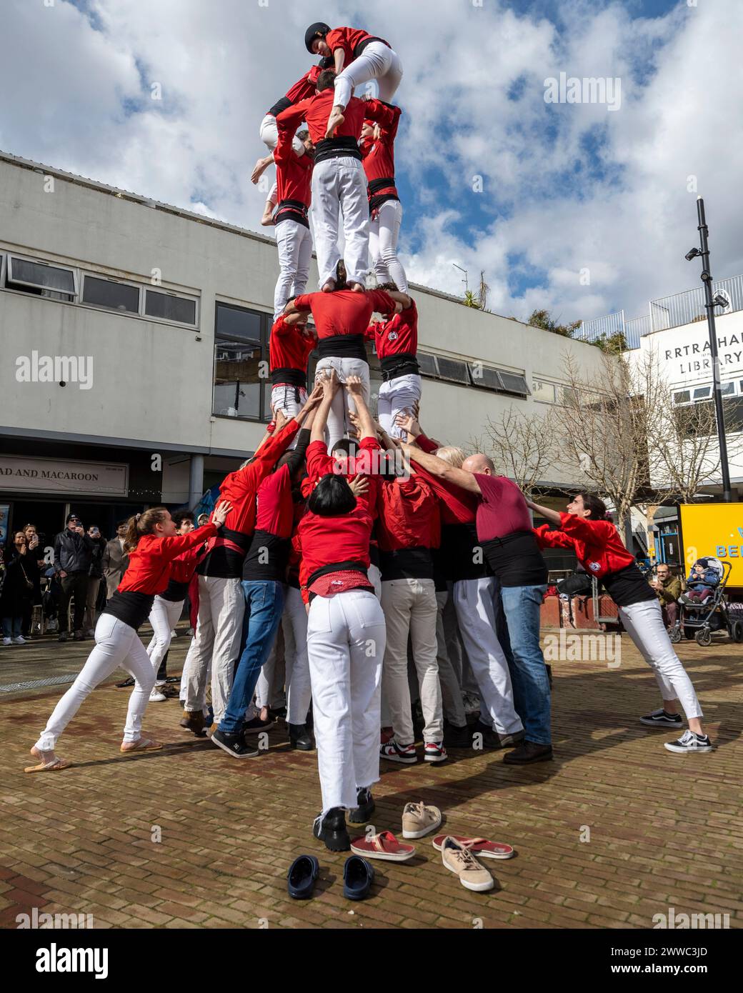 London, UK. 23 March 2024. Castells, ‘human towers’, are built by ...