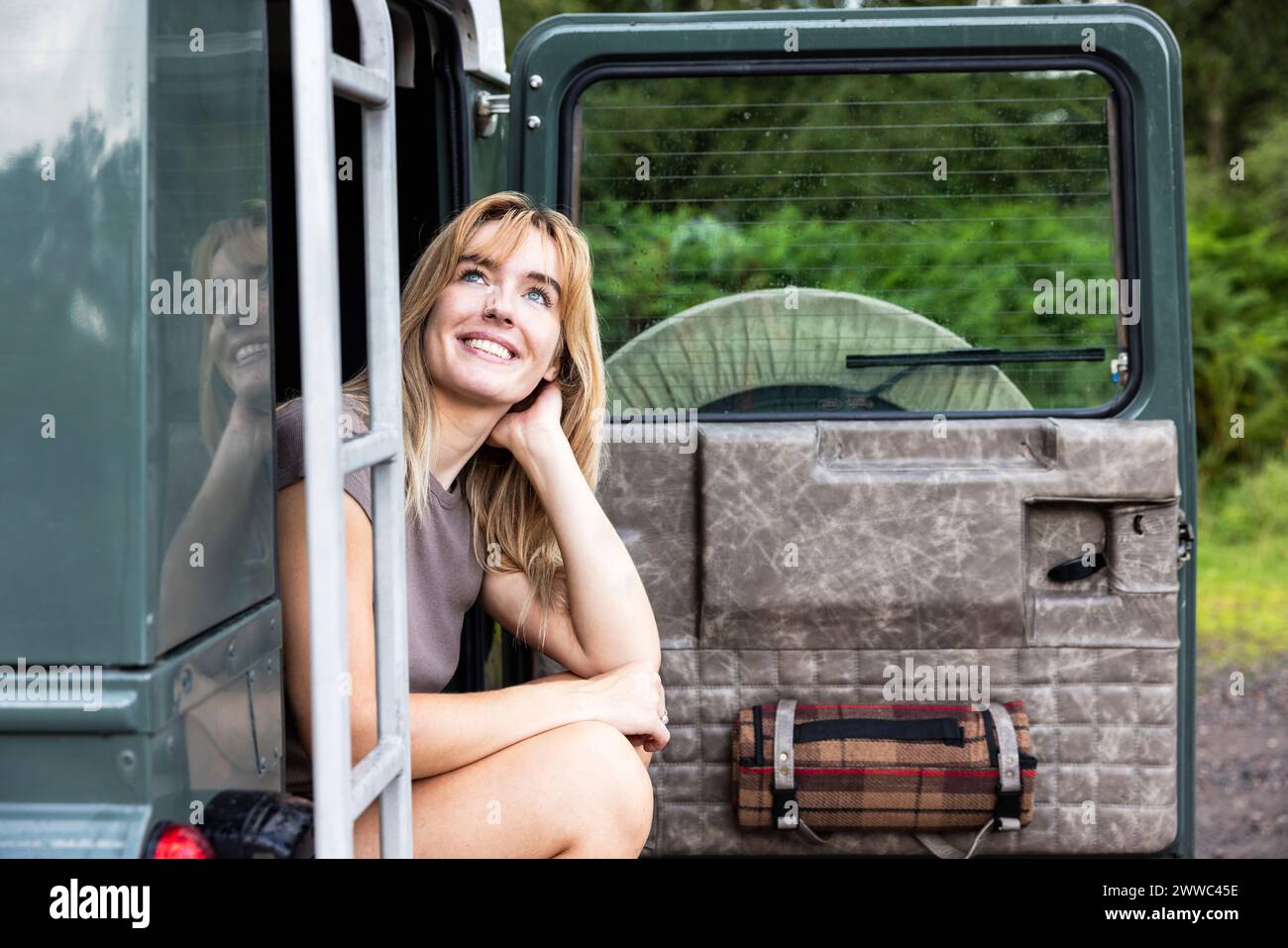 Beautiful women sitting in cars hi-res stock photography and images - Alamy