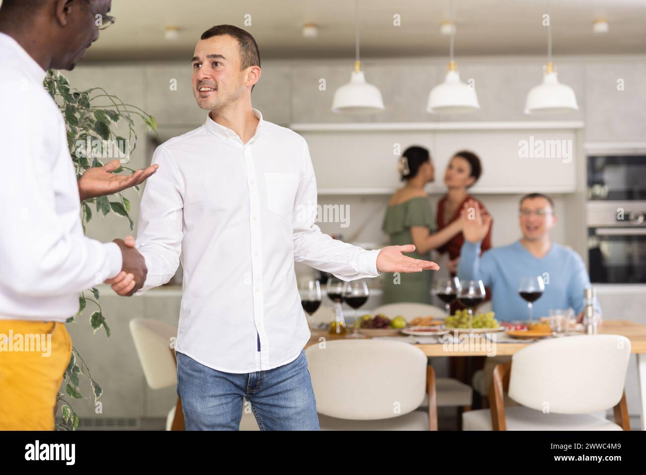 Relaxed party guest hi-res stock photography and images - Alamy