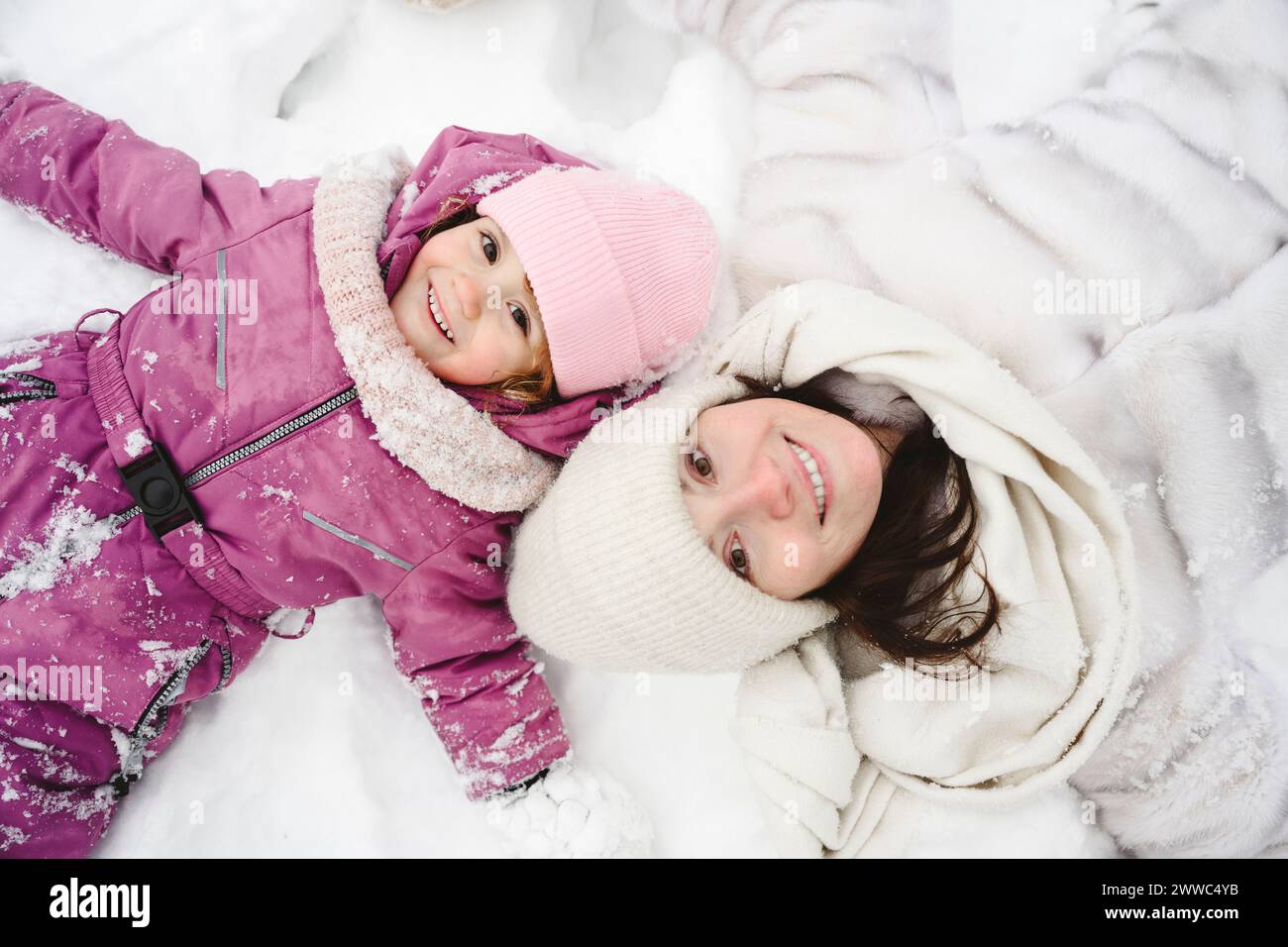 Daughter lying on top hi-res stock photography and images - Alamy
