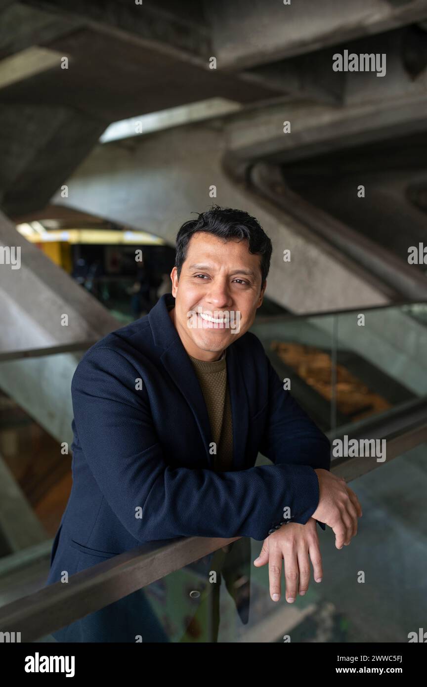 Businessmen leaning at railing hi-res stock photography and images - Alamy