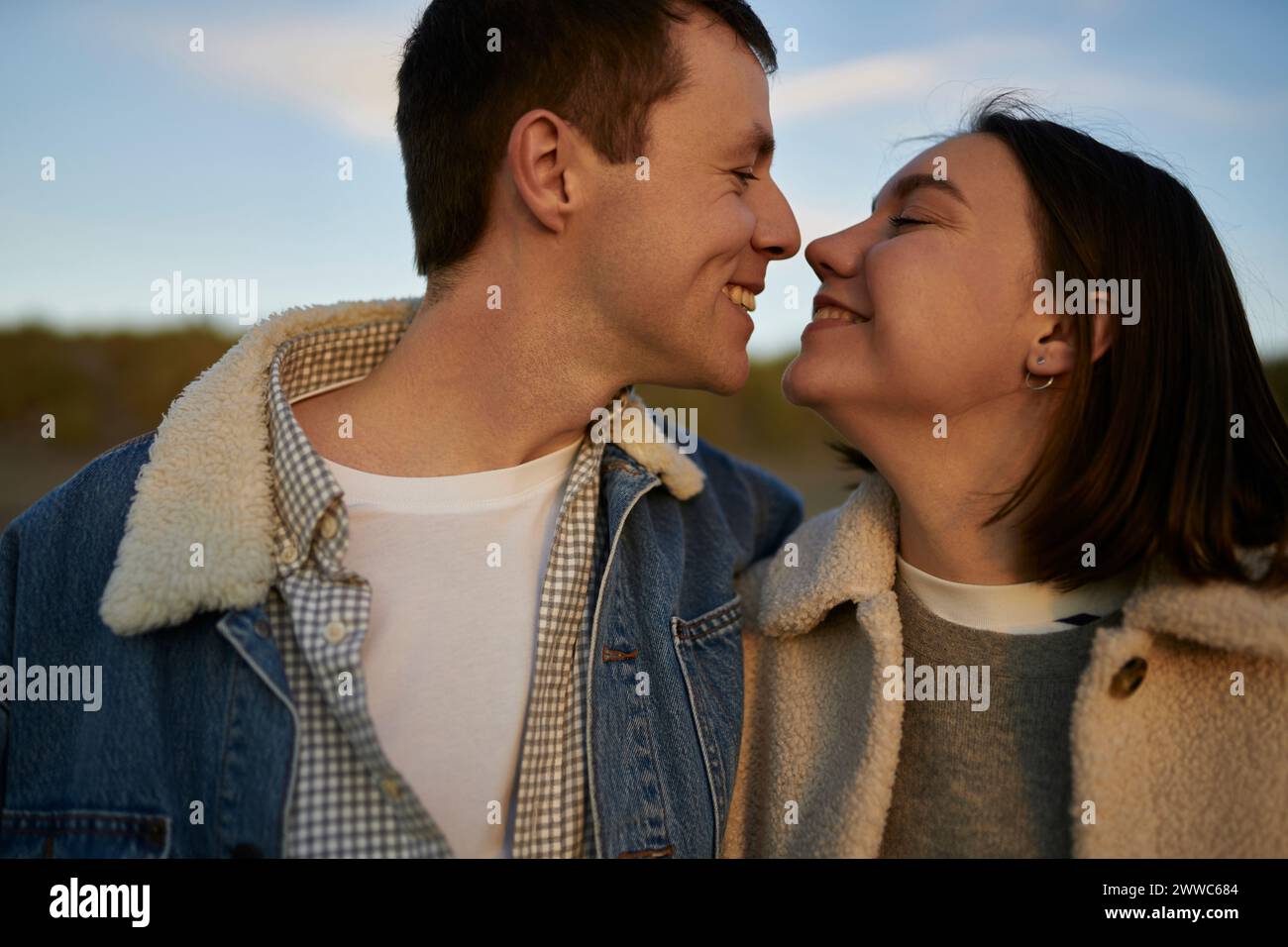 Affectionate couple beach hi-res stock photography and images - Alamy