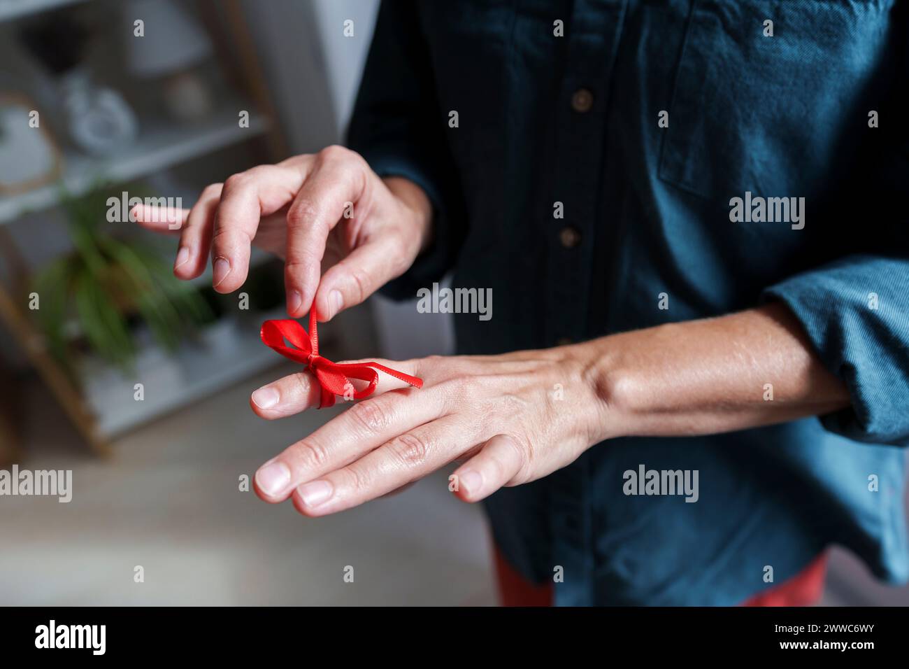 Tied up woman ribbon hi-res stock photography and images - Alamy