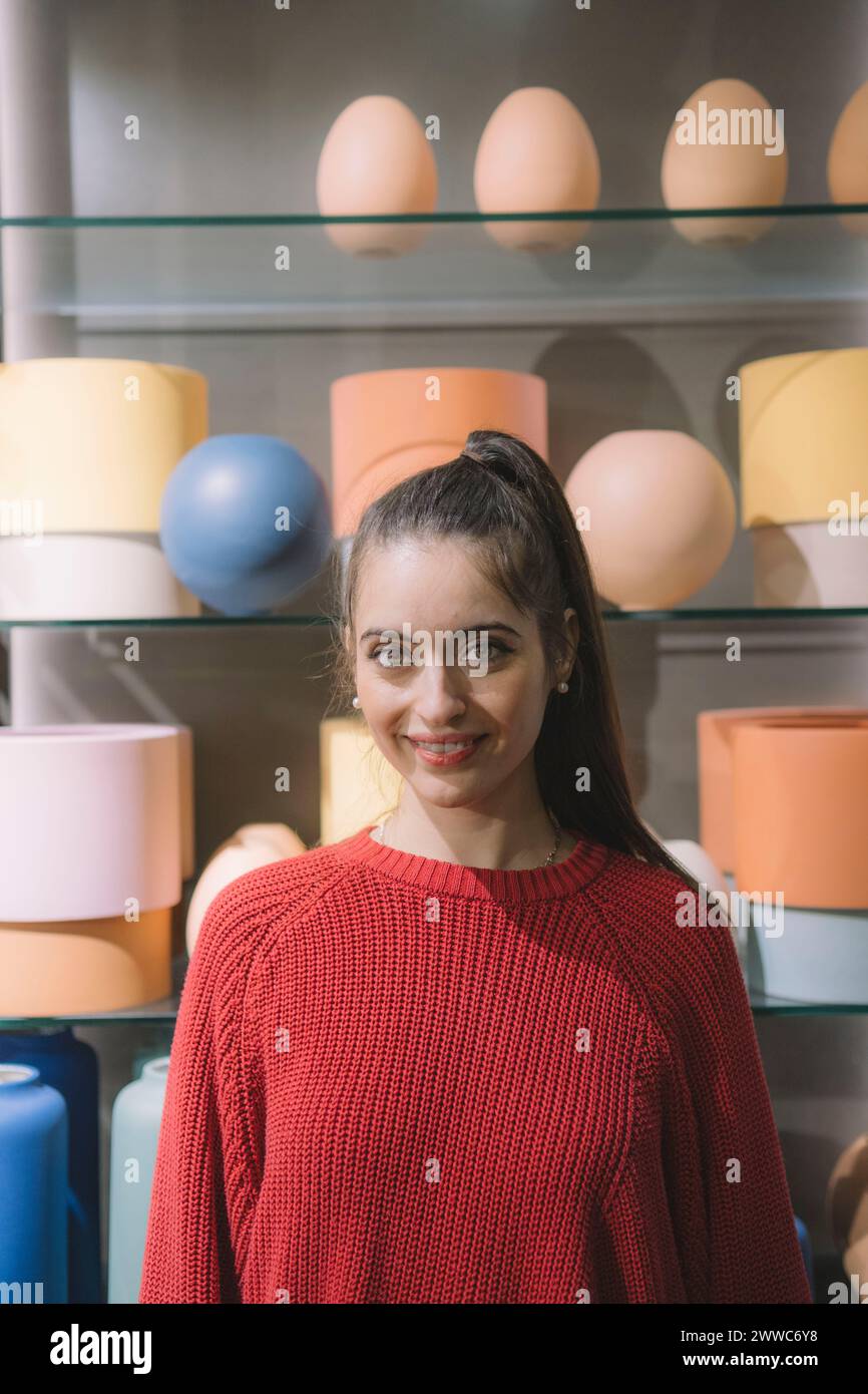 Woman wearing red sweater hi-res stock photography and images - Alamy