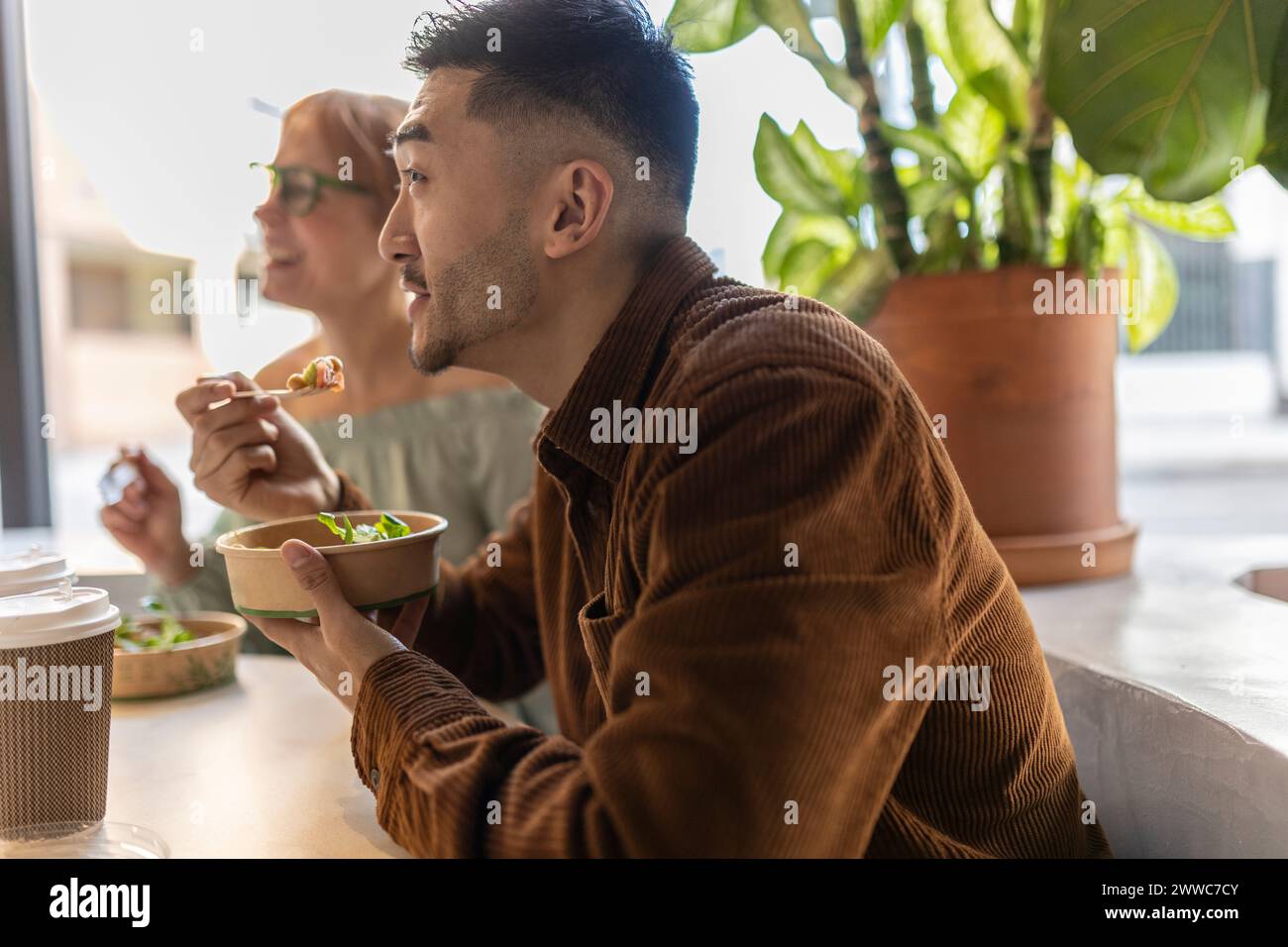 Man eating out of woman body hi-res stock photography and images - Alamy