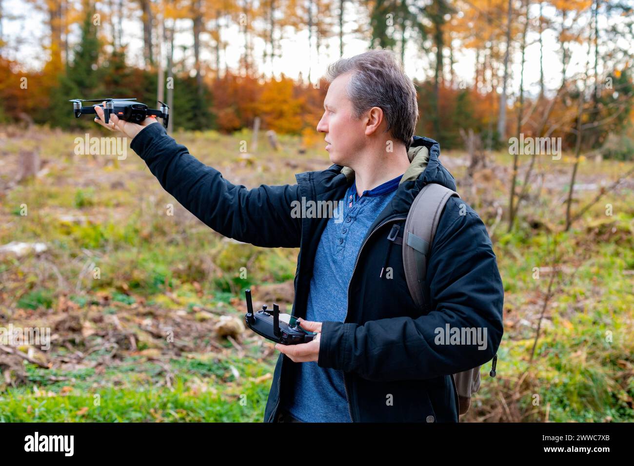 Man launching drone hi-res stock photography and images - Alamy