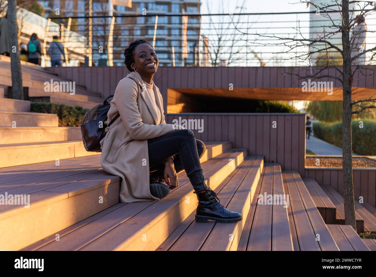 Person sits on stairs hi-res stock photography and images - Alamy