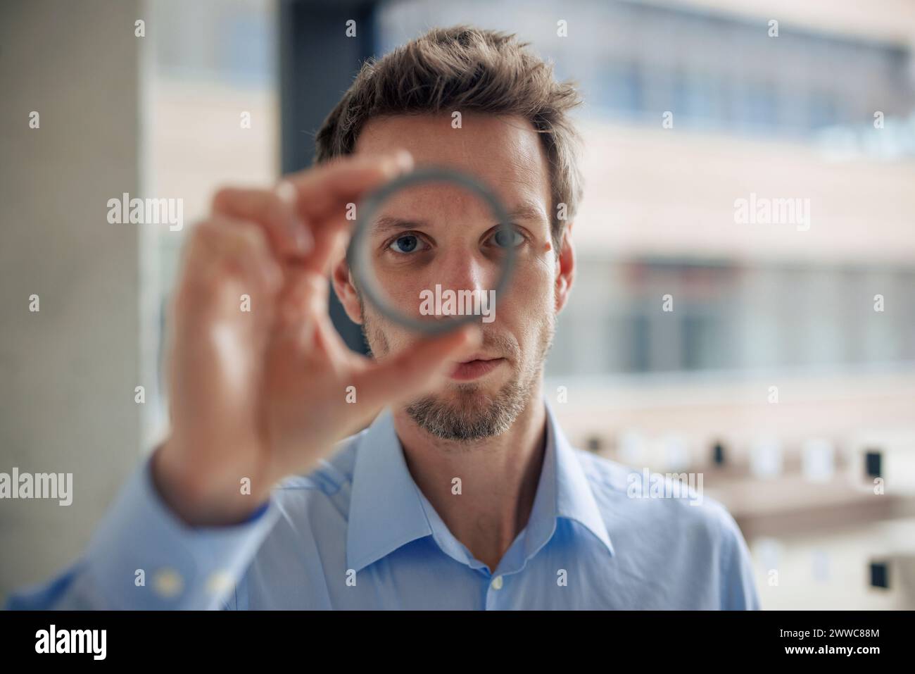 Man looking through parts hi-res stock photography and images - Alamy