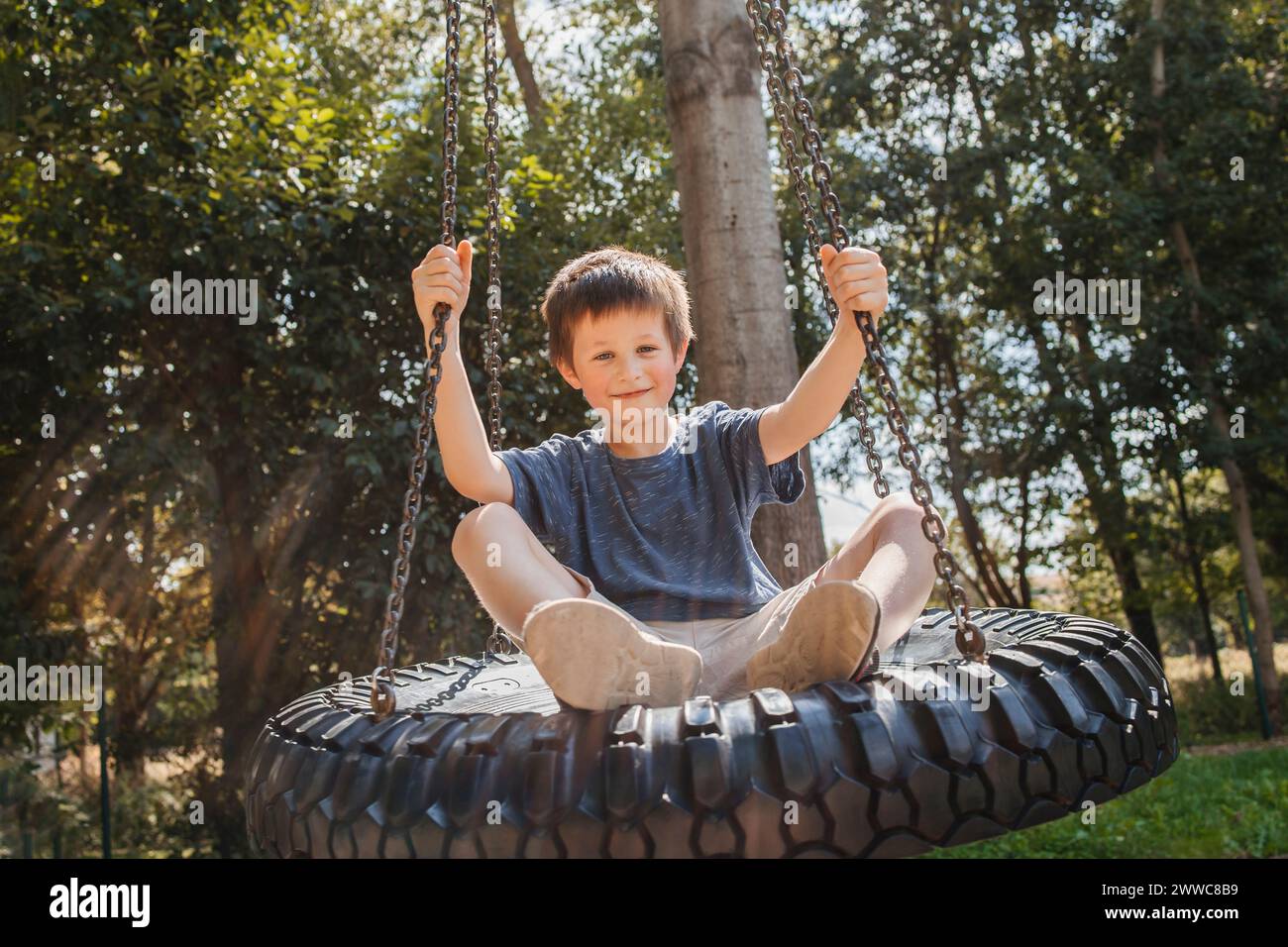 Tyres playground swing swings hi-res stock photography and images - Alamy