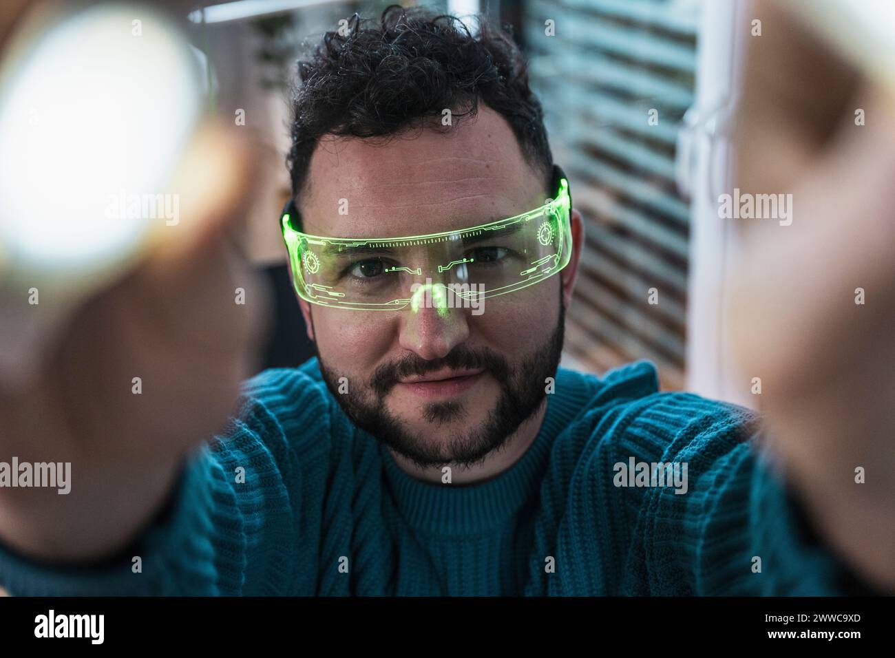 Man wearing smart glasses at home Stock Photo - Alamy