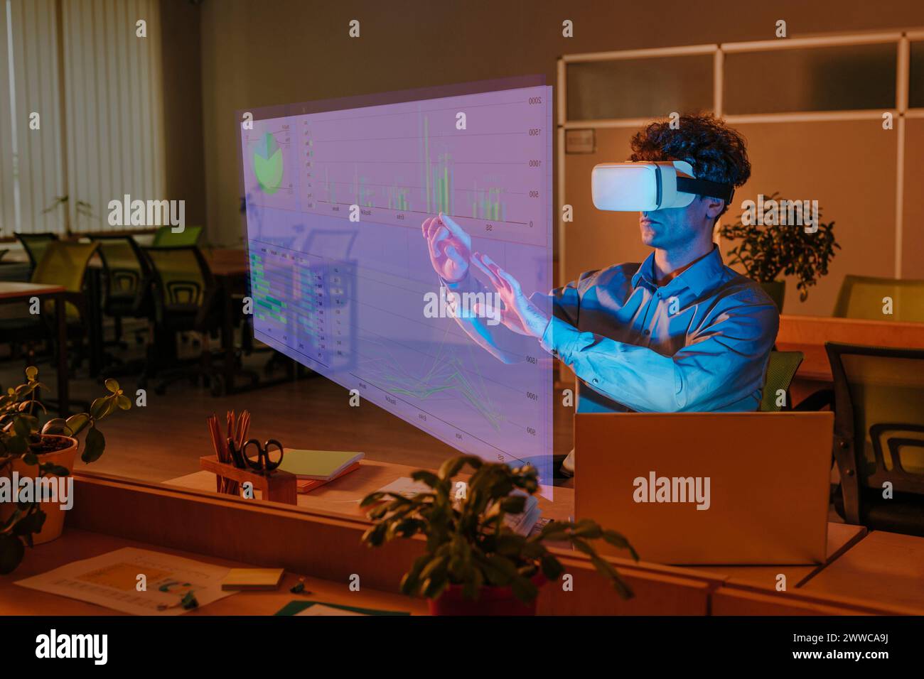 Businessman interacting with graphical interface using virtual reality ...