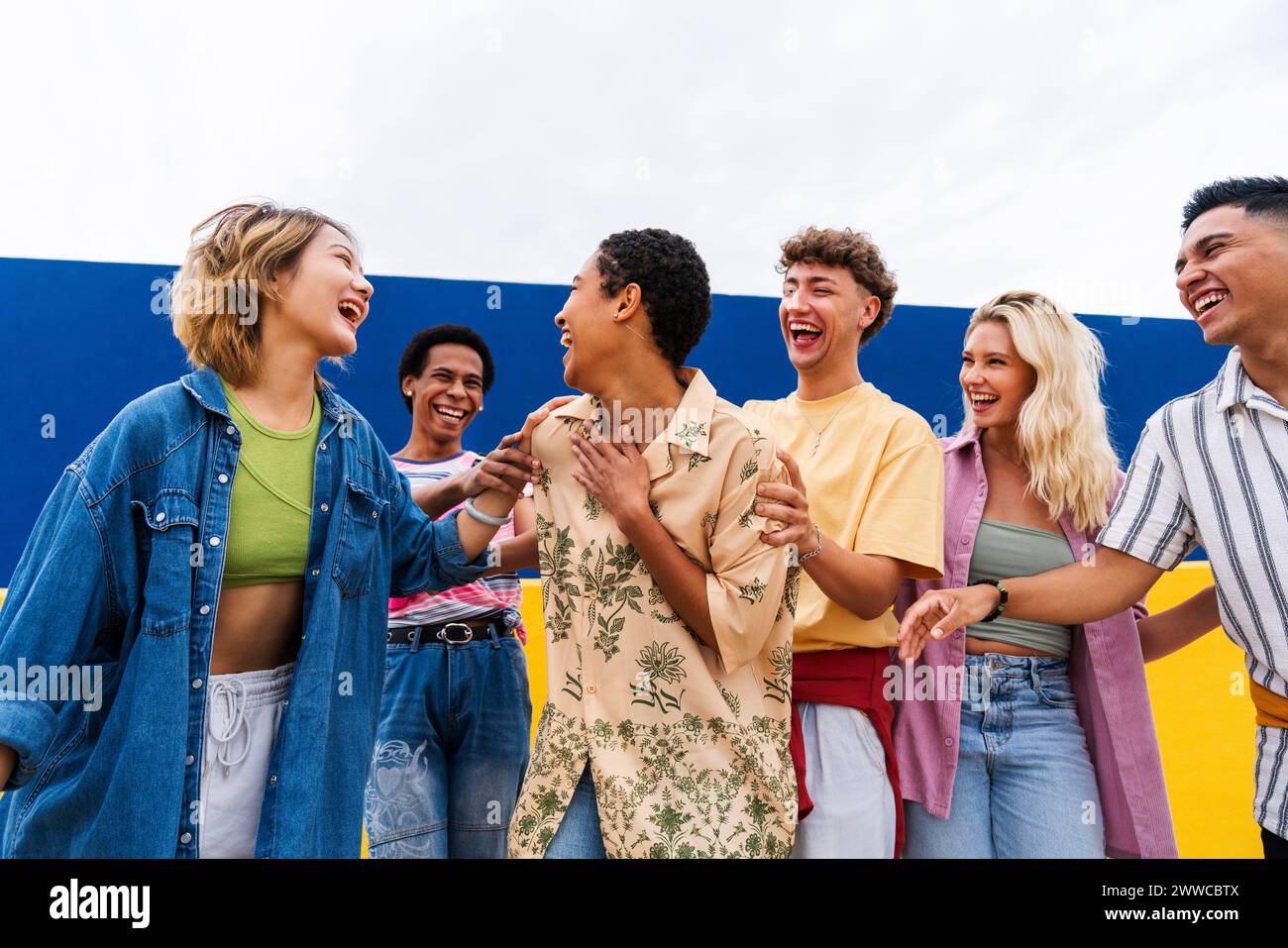 Group of friends are happy for young woman and encouraging her Stock ...