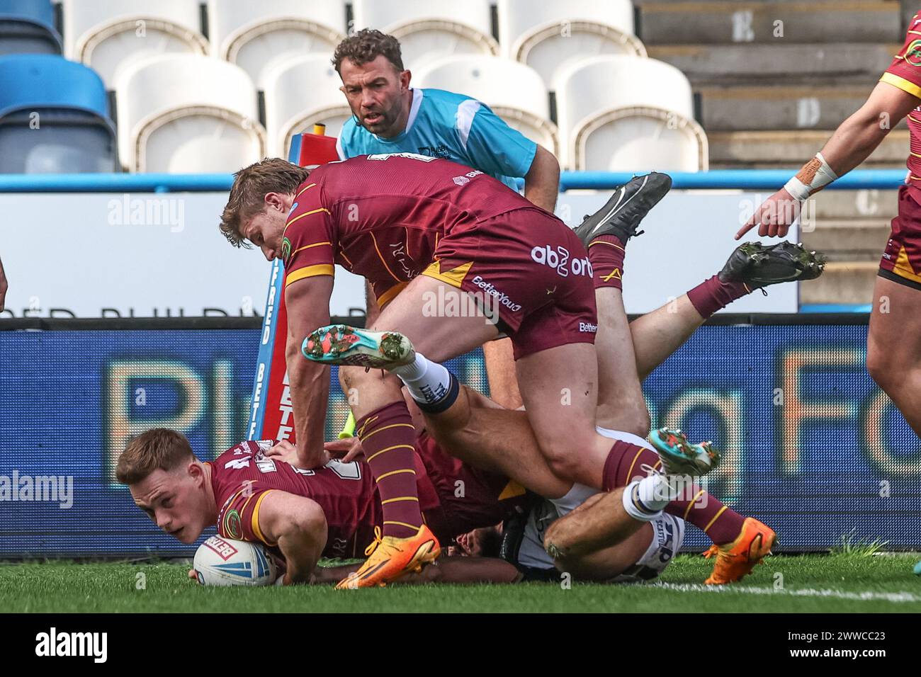 Sam Halsall of Huddersfield Giants goes over for a try to make it 14-6 ...