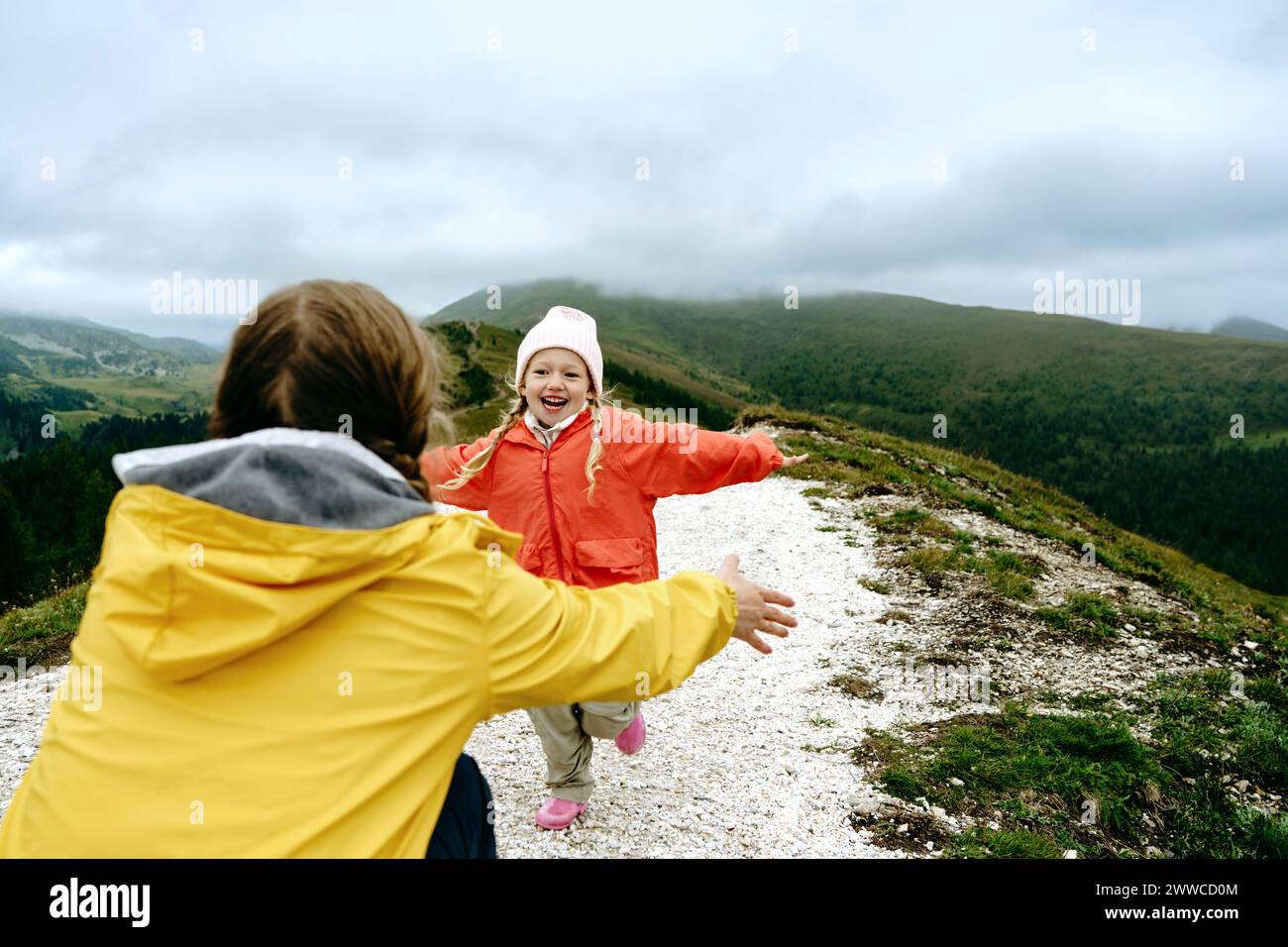 A raincoat on his head hi-res stock photography and images - Alamy