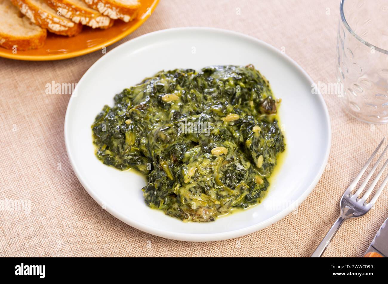 Traditional regional Spanish dish is spinach in Catalan Stock Photo - Alamy