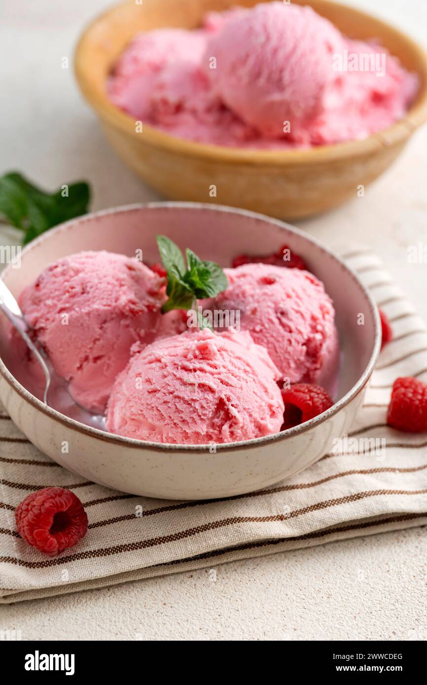Bowl of raspberry ice cream Stock Photo - Alamy