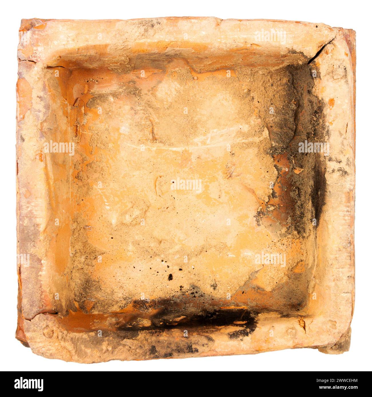 Old orange furnace tile isolated on white background Stock Photo - Alamy