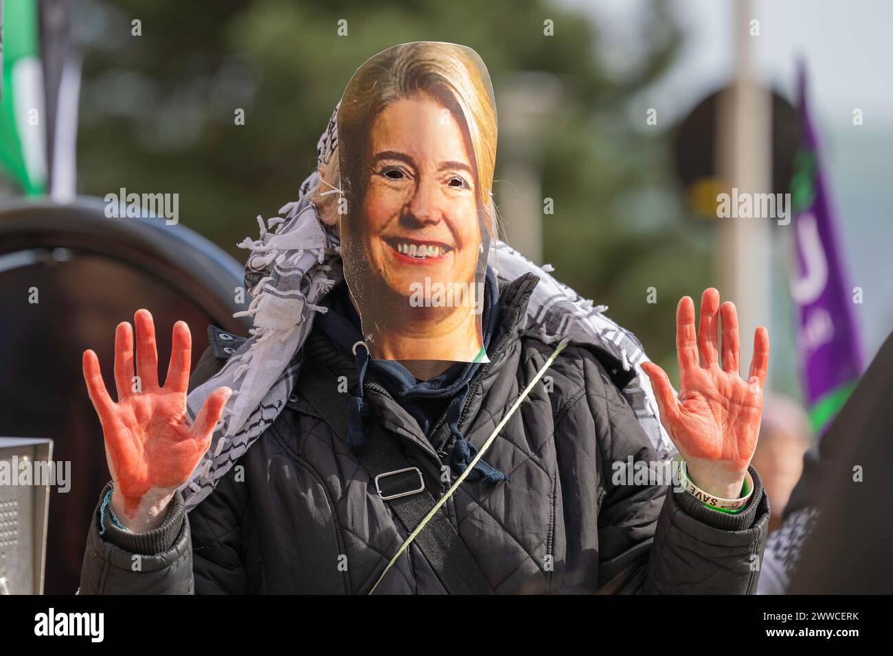 Southend on Sea, UK. 23rd Mar, 2024. A protester wears a face mask of ...