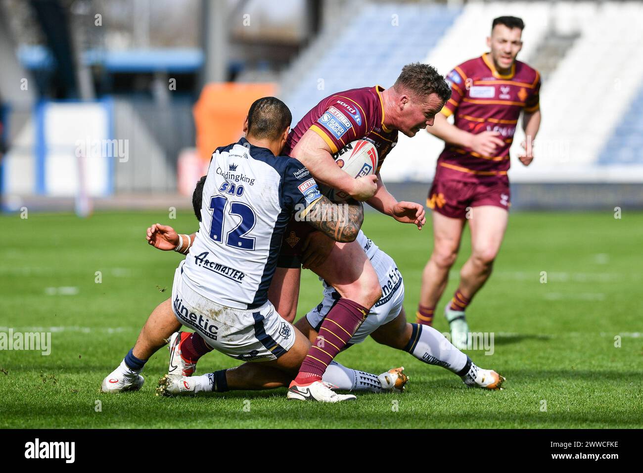 Huddersfield, UK. 23rd Mar, 2024. Adam Milner (9) of Huddersfield ...