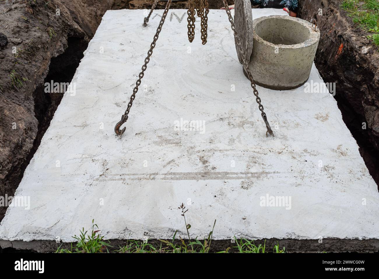 Concrete septic tank with a capacity of 10 m3 located in the garden ...