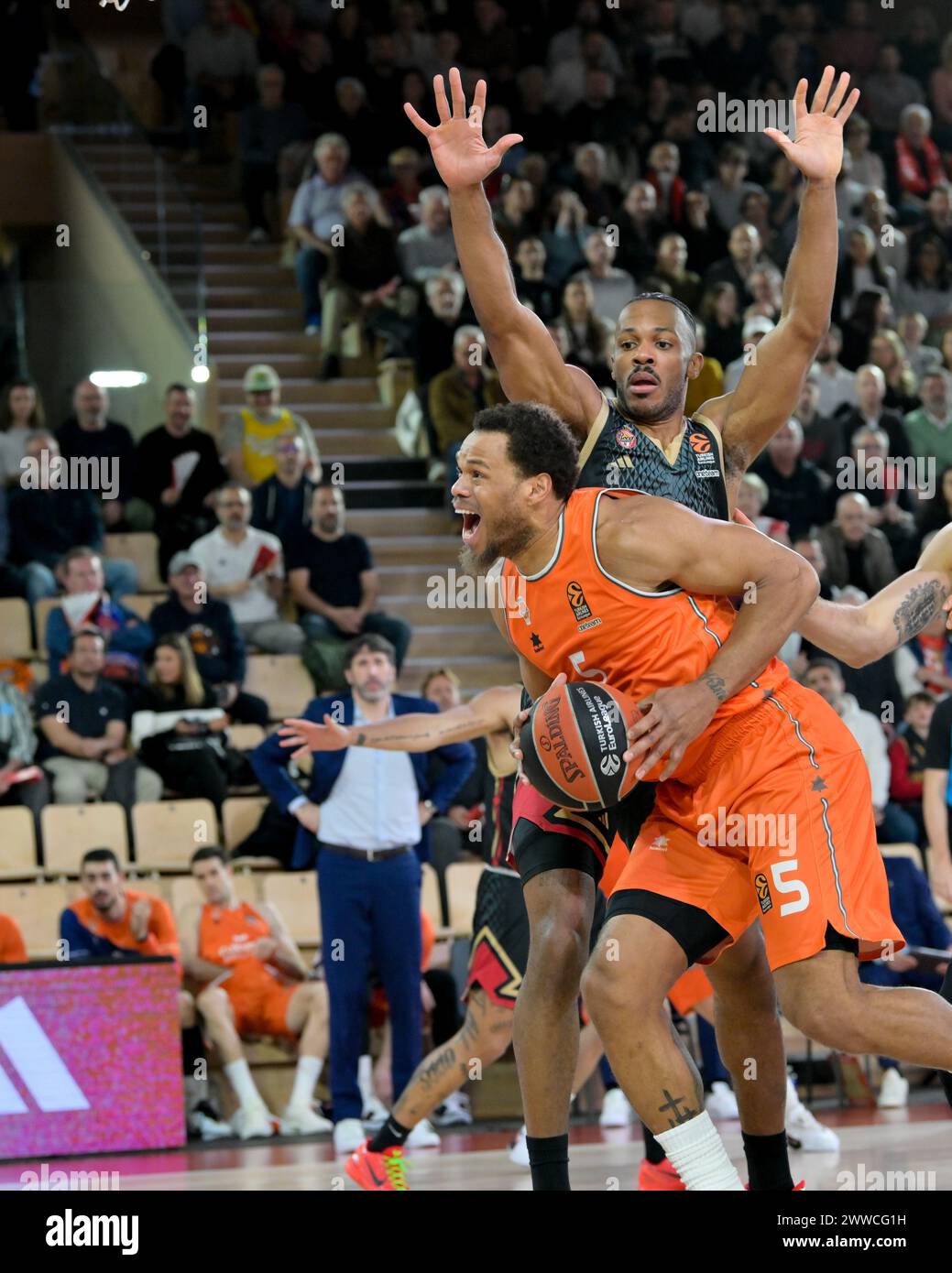 Valence player #5 Justin Anderson and Monaco player #4 Jon Blossomgame ...