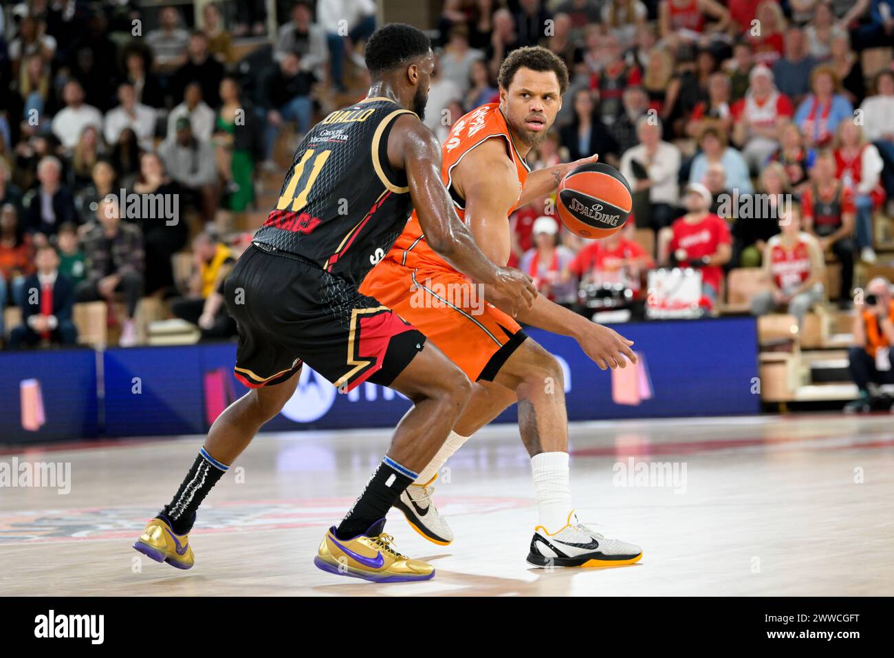Valence player #5 Justin Anderson and Monaco player #11 Alpha Diallo ...