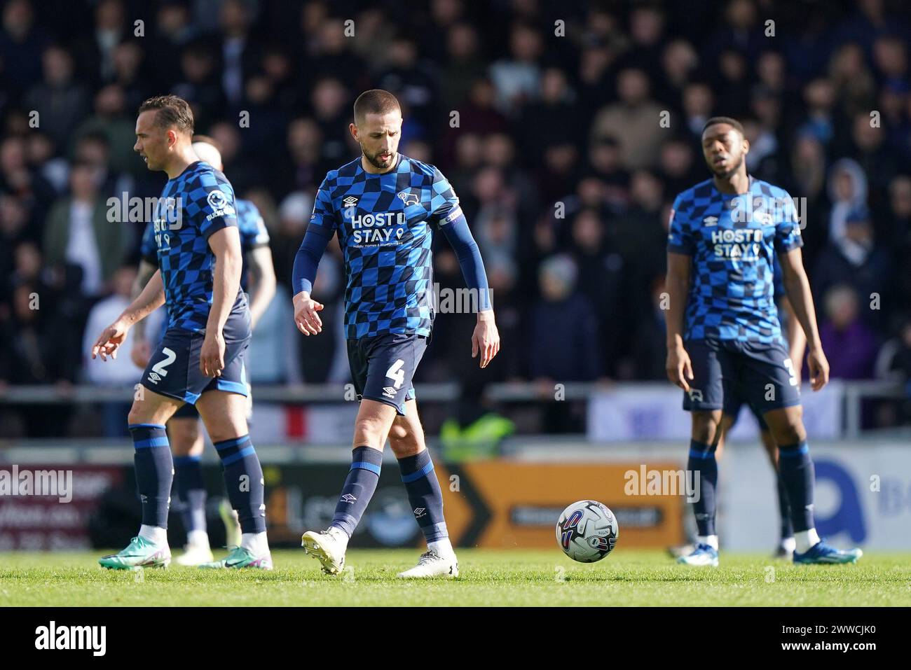 Derby County's Conor Hourihane (centre) reacts after Northampton Town's ...