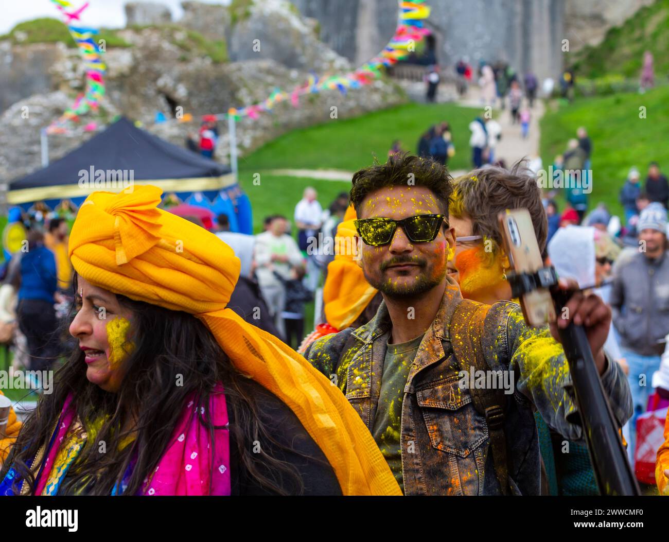 Corfe Castle, Dorset, UK. 23rd March 2024. Holi, the Hindu festival of ...