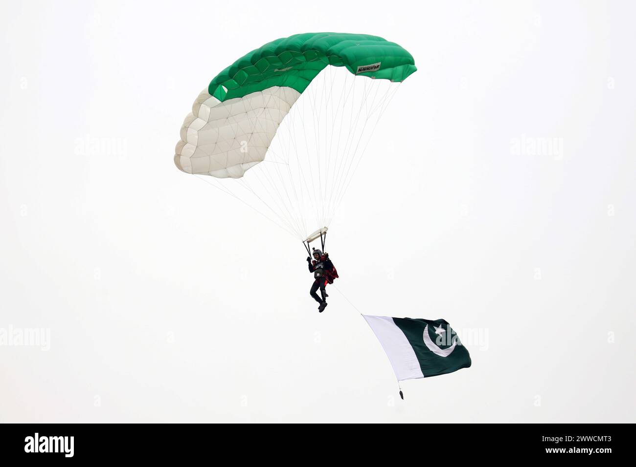 Islamabad. 23rd Mar, 1940. A Pakistan air force paratrooper performs ...