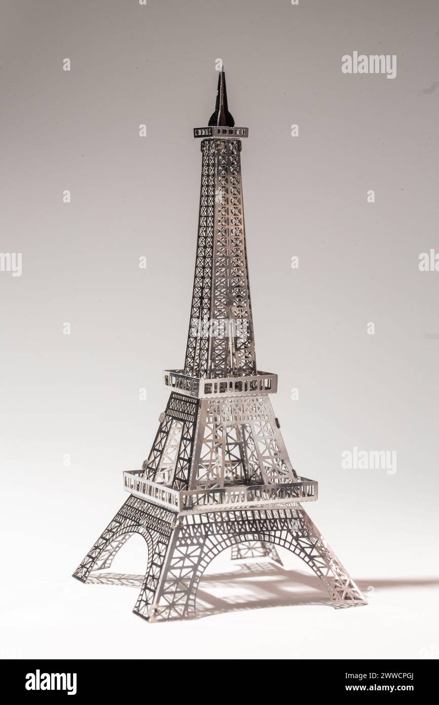 Metal Eiffel Tower cutout on white background. Lattice design ...