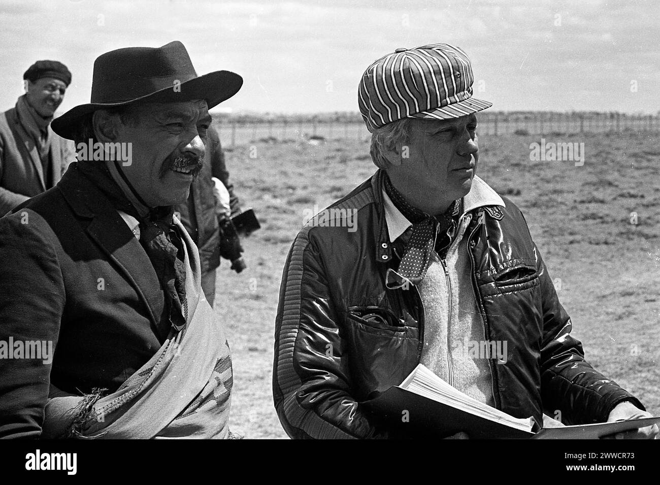 Argentine filmmaker Héctor Olivera (right) gives instructions to ...