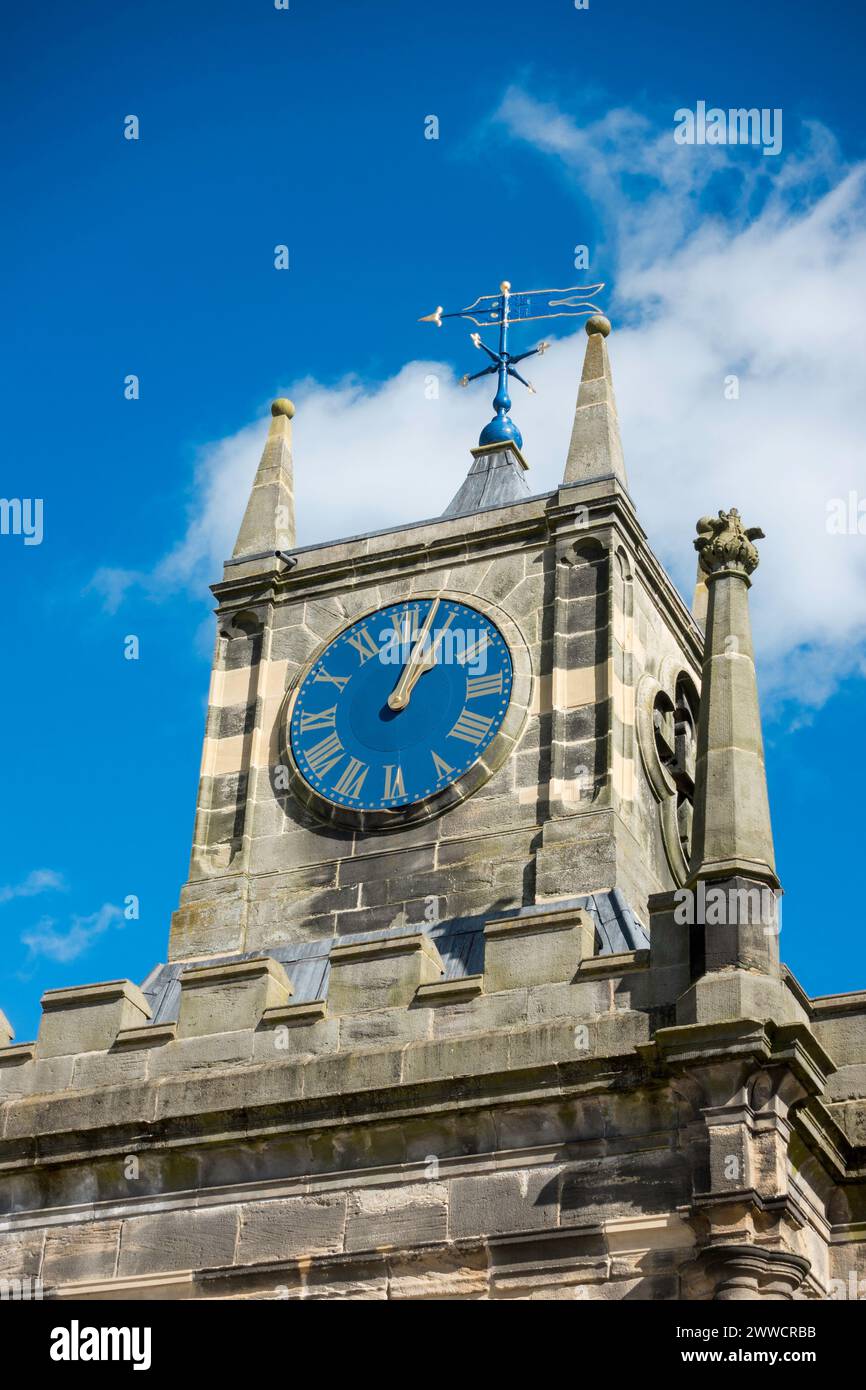 Clock tower and weather vane above the entrance to the Bishop's park in ...