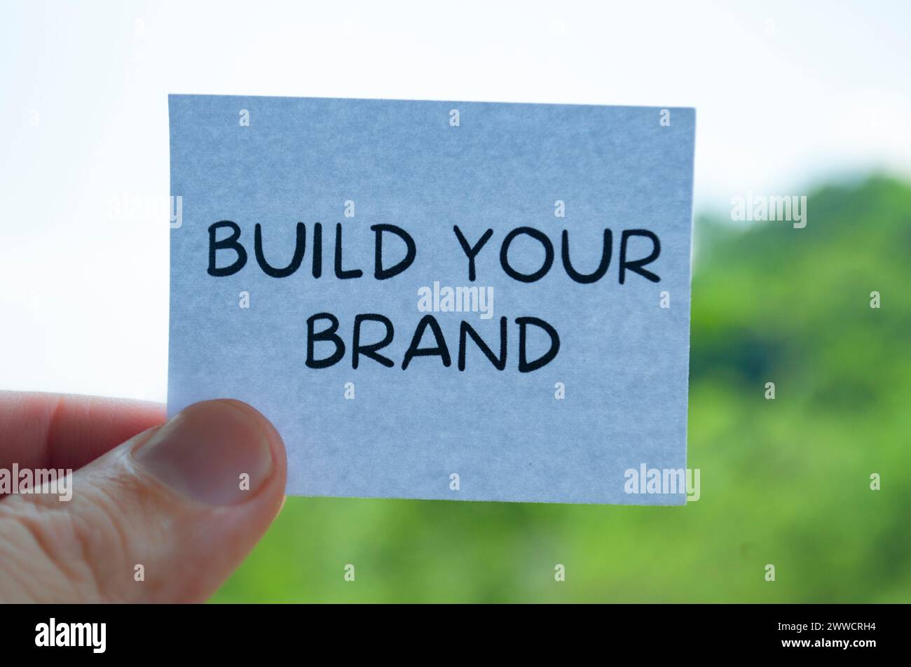 Build your brand text on white paper notepad with nature background ...