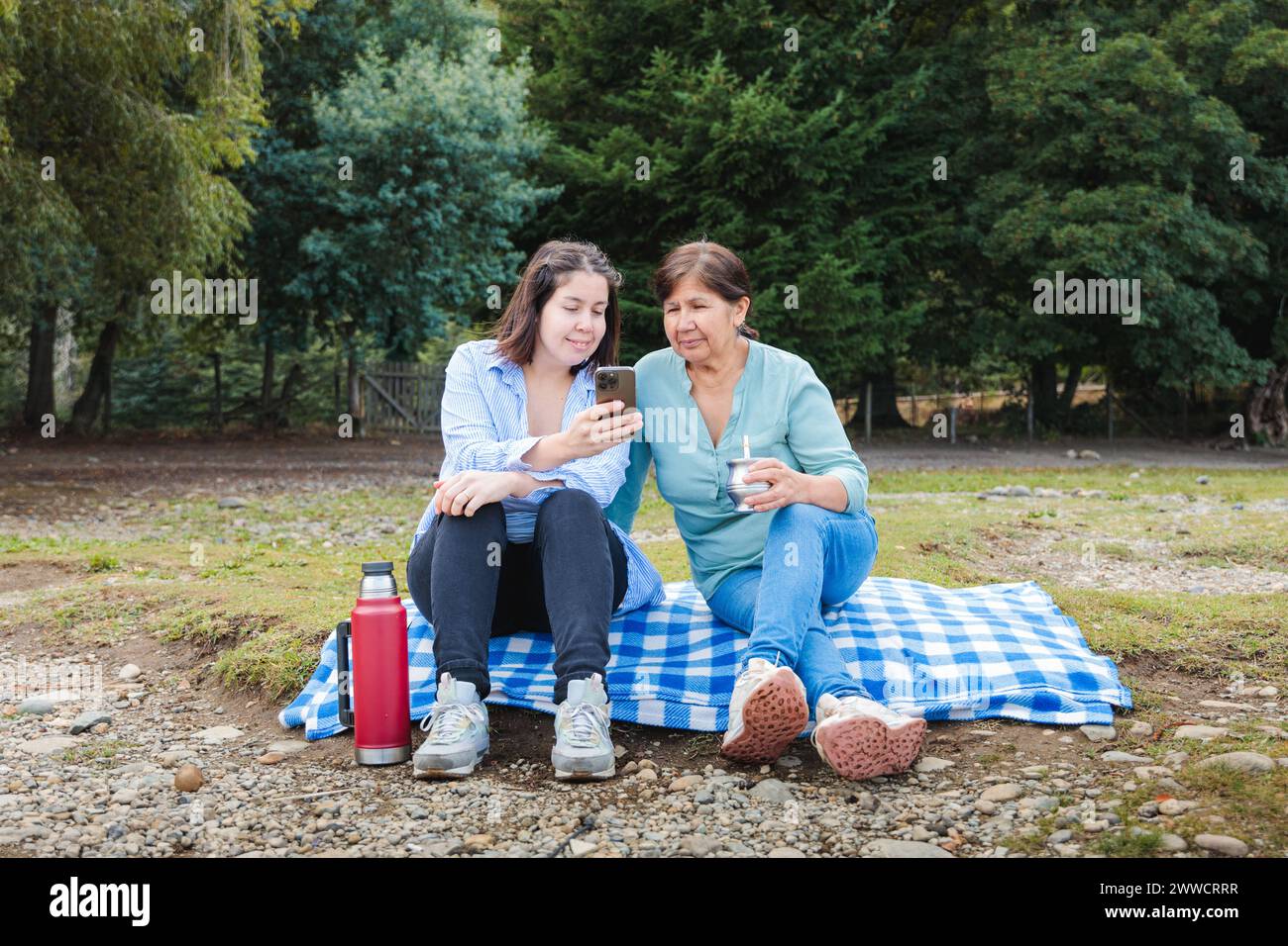 Maternal Bonding: Latin Mother and Adult Daughter Enjoy Yerba Mate ...