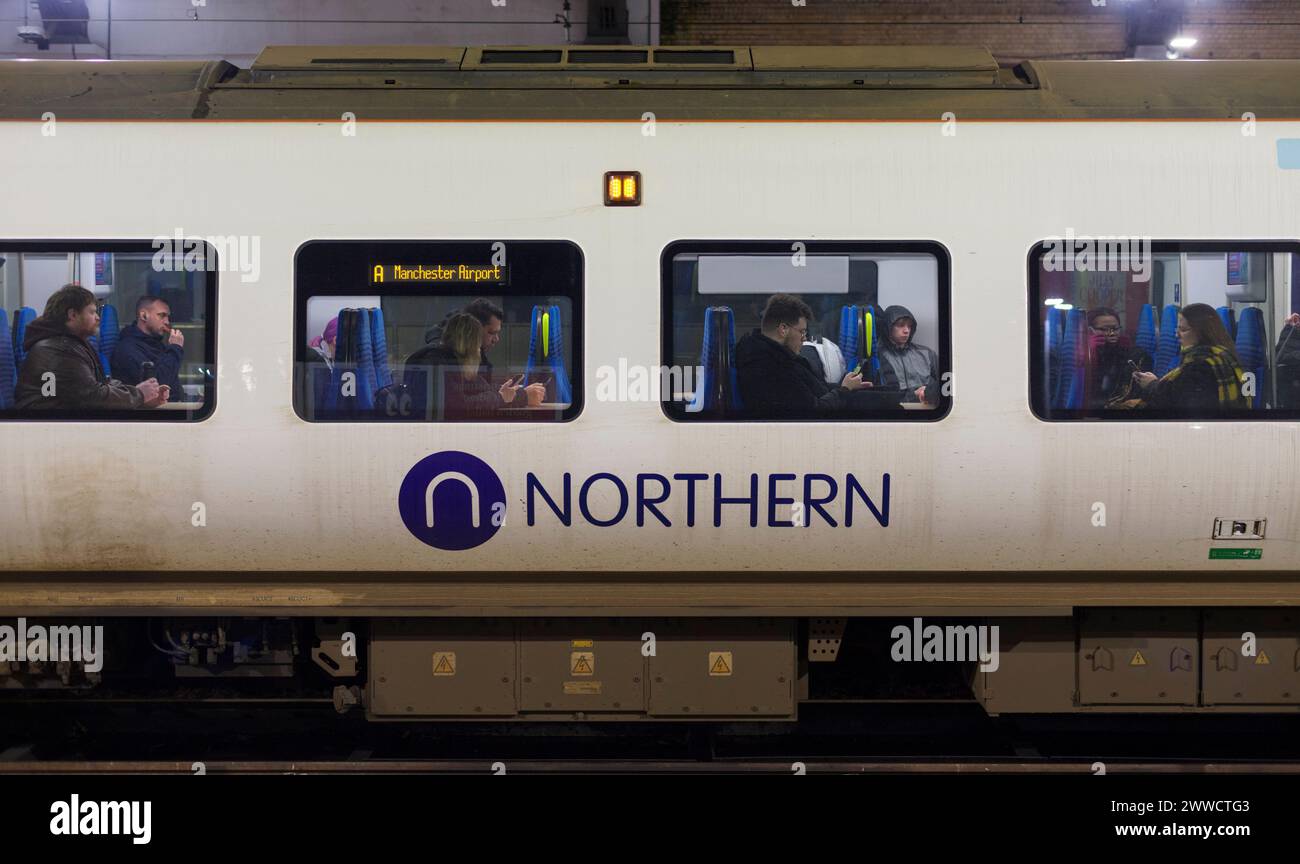 Rail commuters on a Northern Rail train at Liverpool Lime street Stock ...