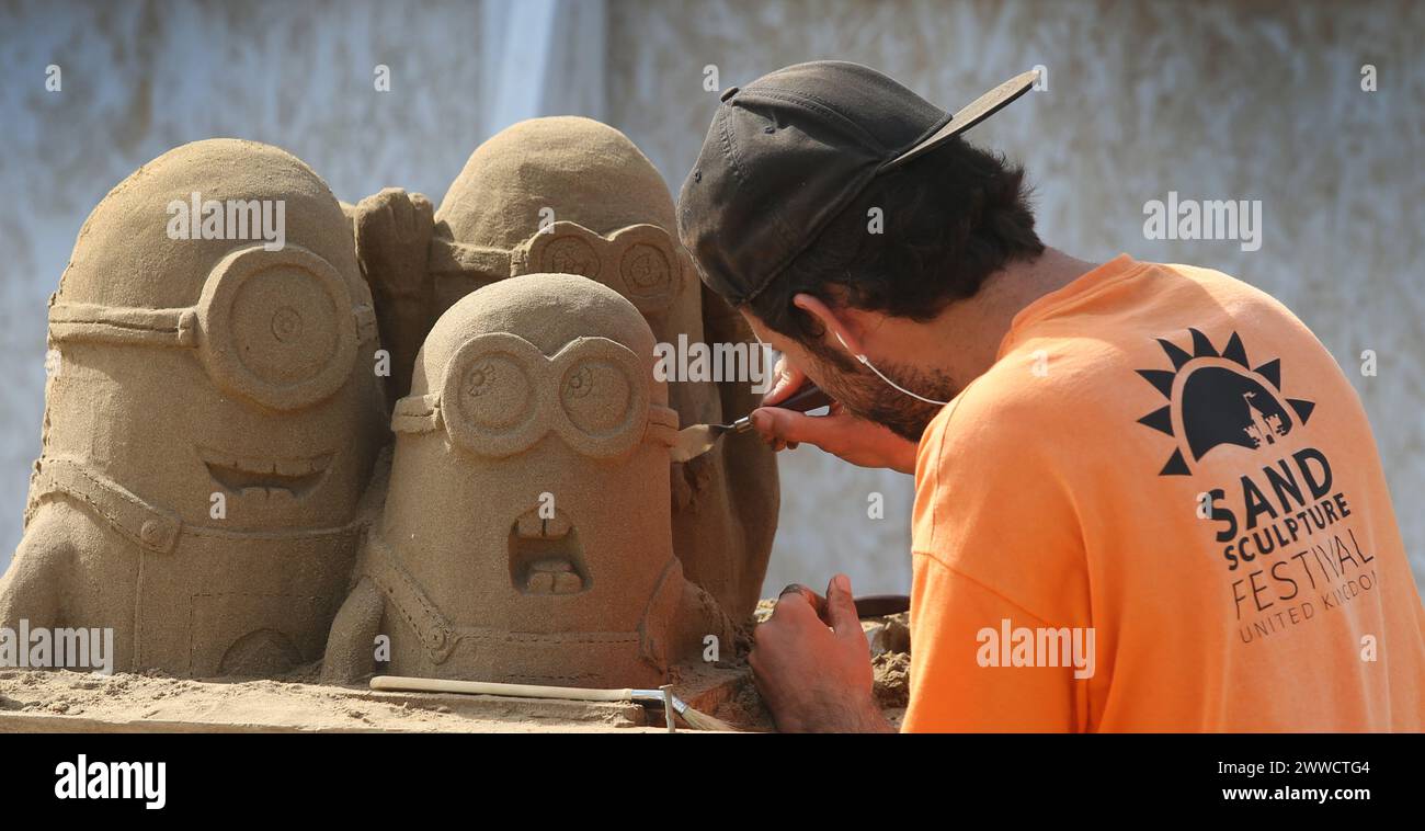 01/09/13 With more hot weather forecast, a man makes a new sand ...