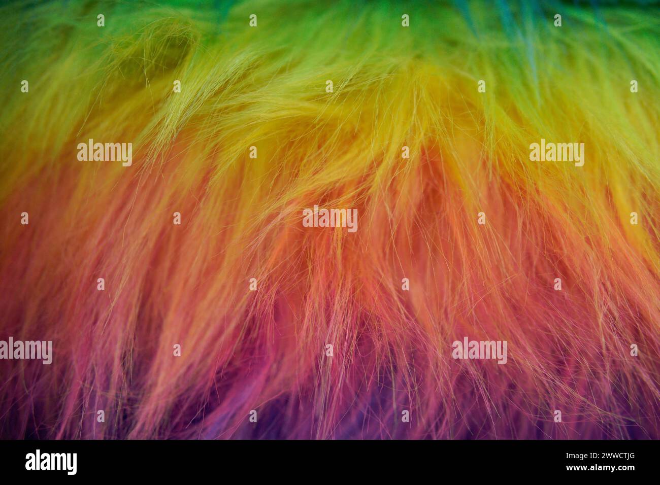 A close-up of an green fake fur, Lime green furry fur texture portrait ...