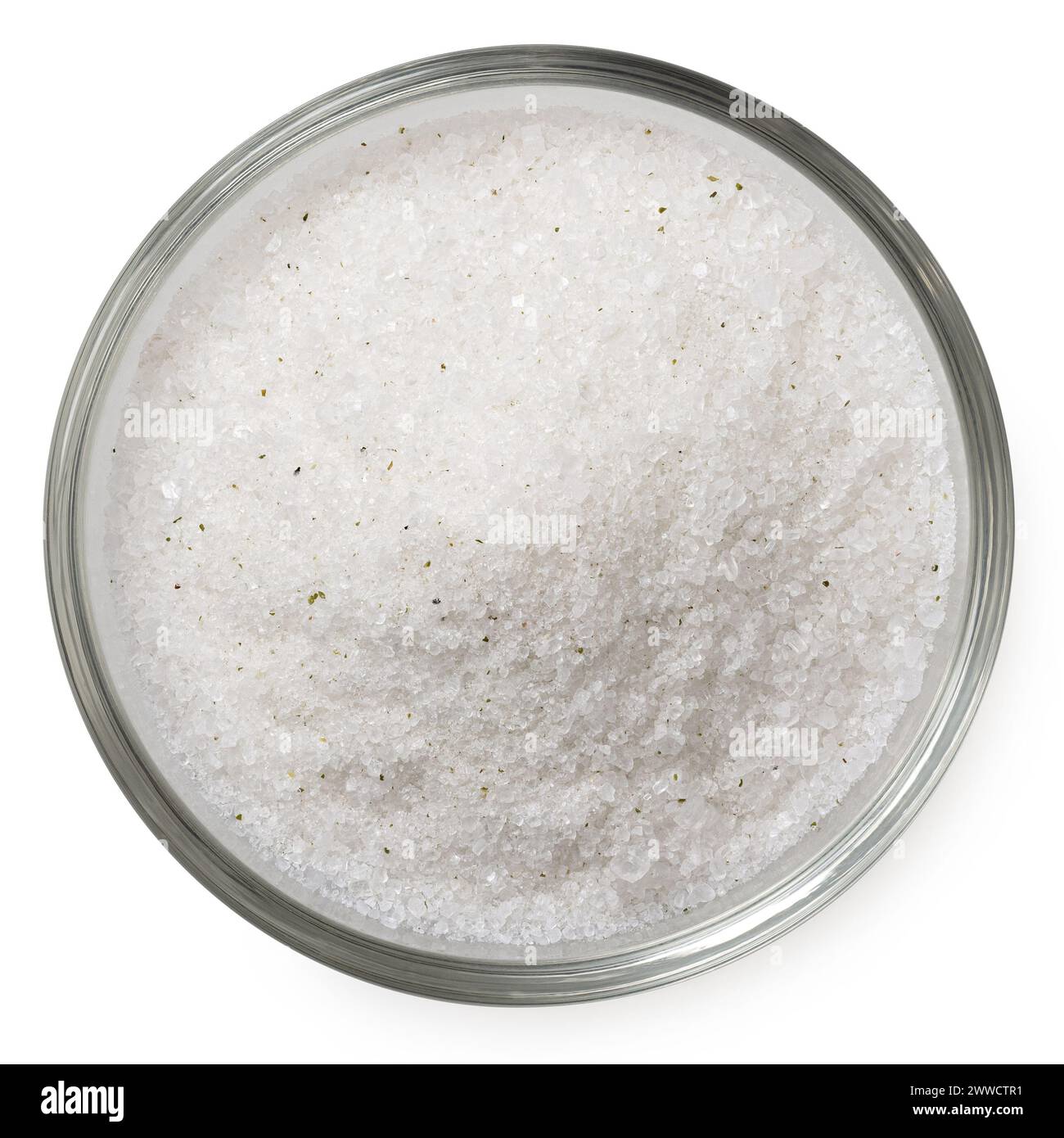 Sea salt with specks of dried seaweed in a glass bowl isolated on white ...