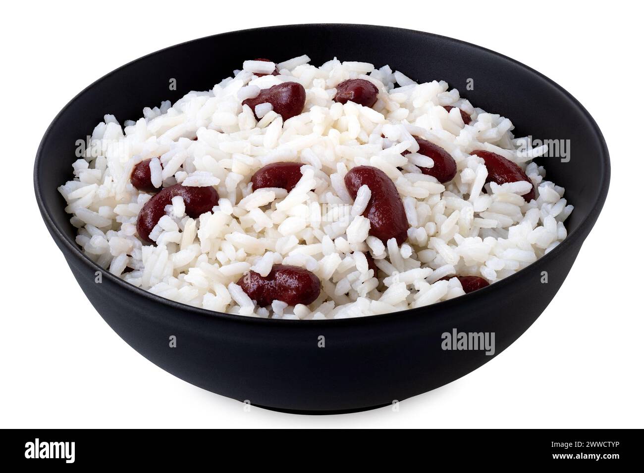 Cooked white rice with red kidney beans in a black ceramic bowl ...