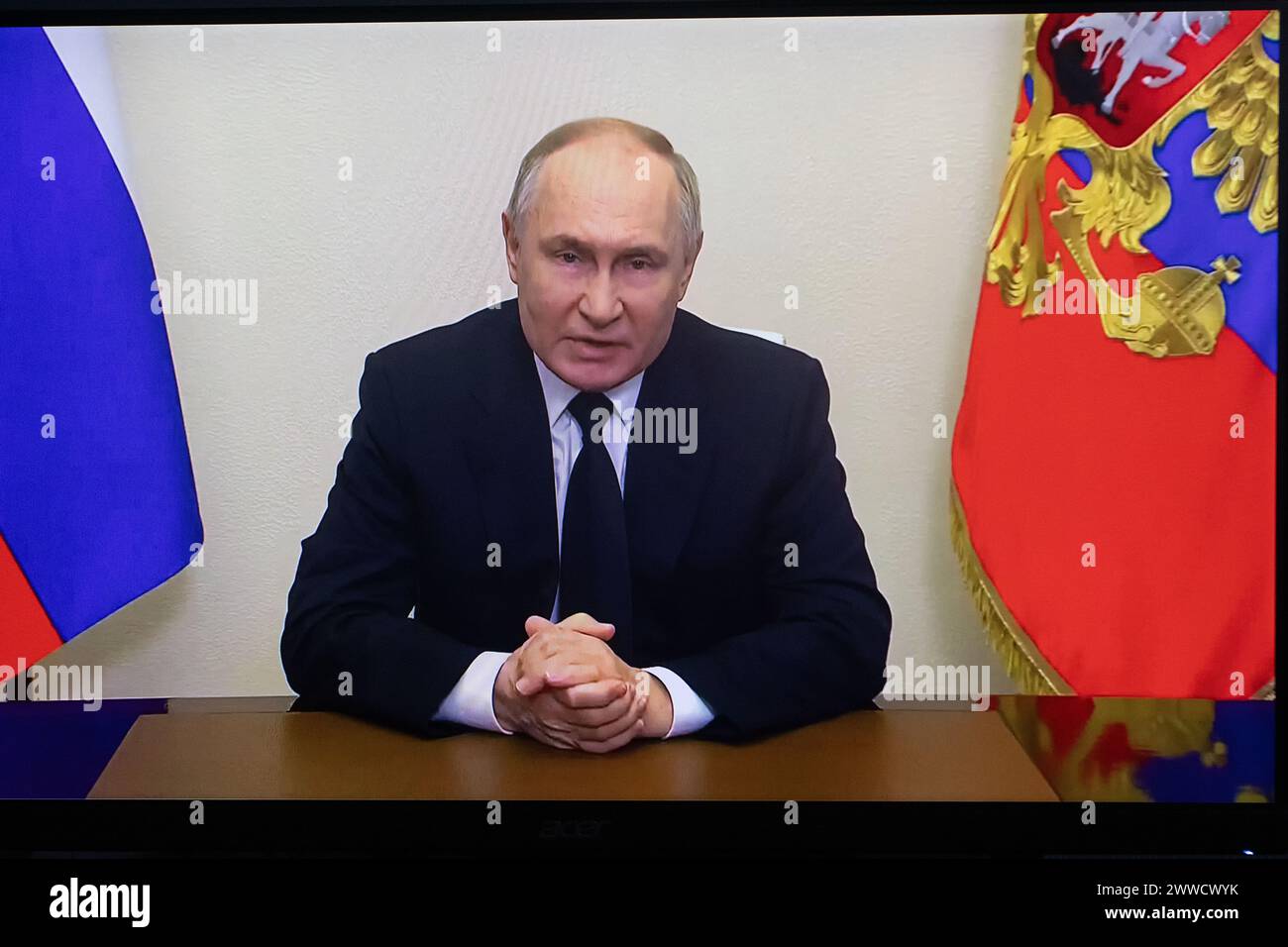 View of Russian President Vladimir Putin picture on a tv screen when ...