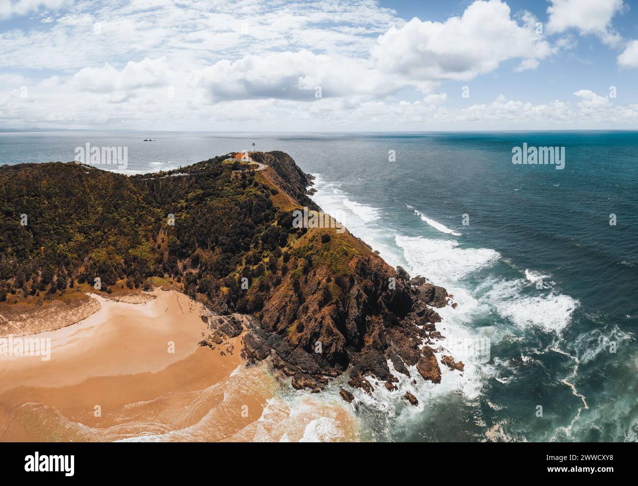Byron Bay lighthouse high on the rocky headland - the most eastern ...