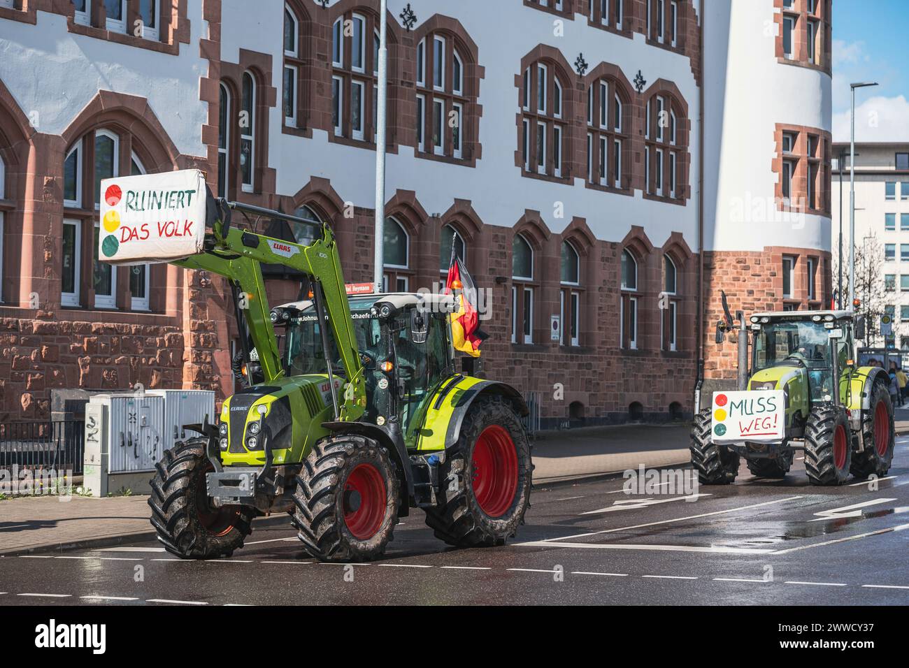 Kaiserslautern, Germany. 23rd March, 2024. Convoy of tractors with ...