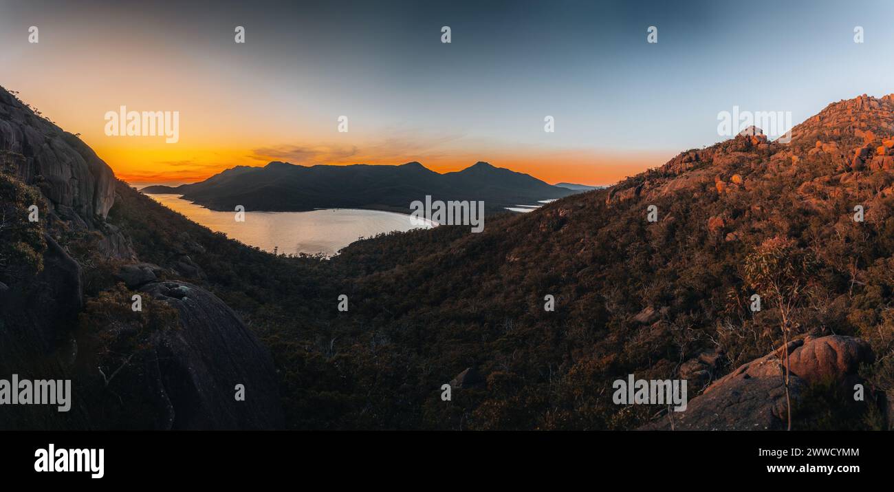 Sunrise Sunset Aerial view of Wineglass Bay beach and mount amos ...
