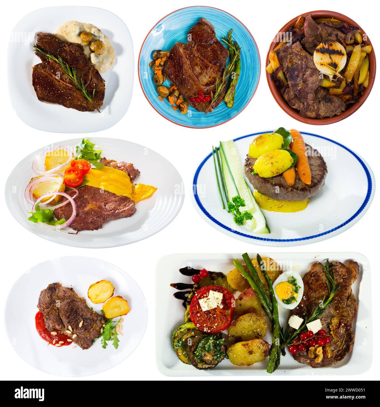 Assorted beef dishes on a white background Stock Photo - Alamy