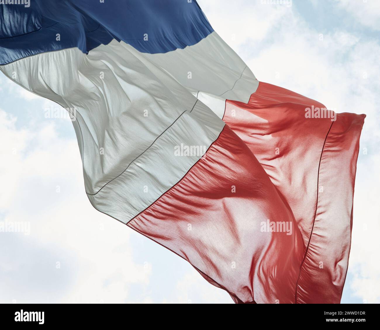 French Flag Waving in Sunshine Stock Photo - Alamy